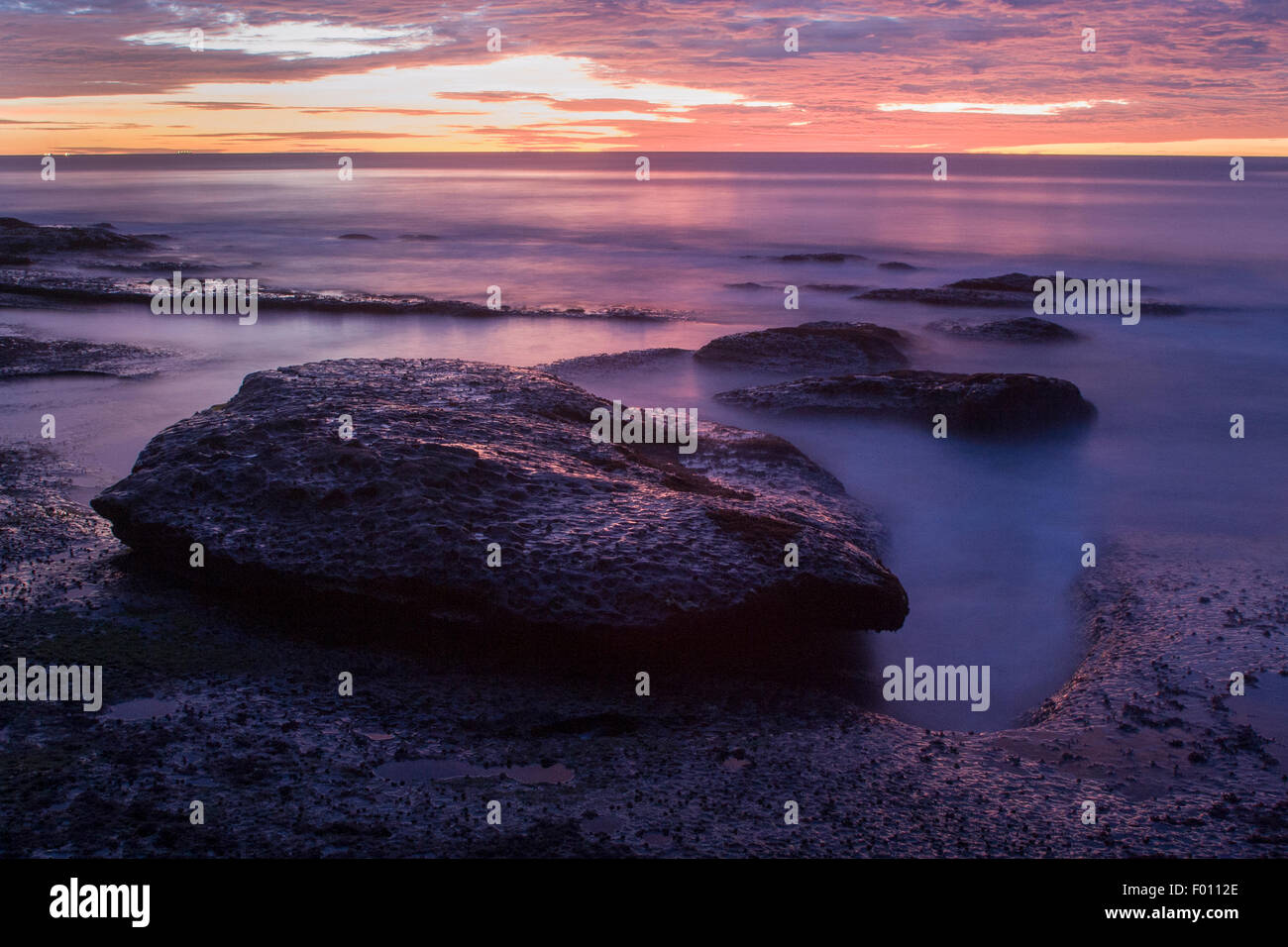 Colorful sunset on the beach. Similajau National Park, Sarawak ...