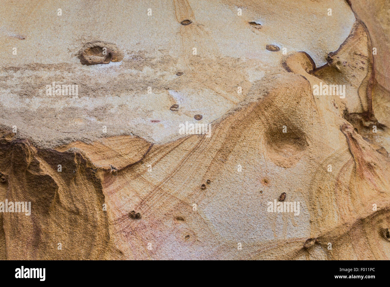 Abstract pattern in a natural sandstone cliff Stock Photo - Alamy