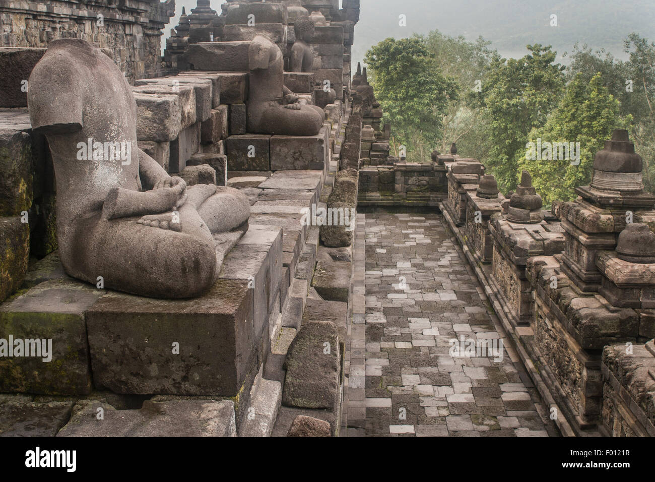 Statue of the Buddha at the 9th-century Buddhist temple, Borobudur, of ...