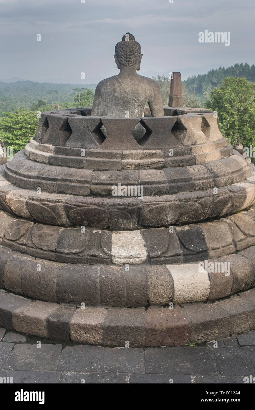 Statue of the Buddha at the 9th-century Buddhist temple, Borobudur, of ...