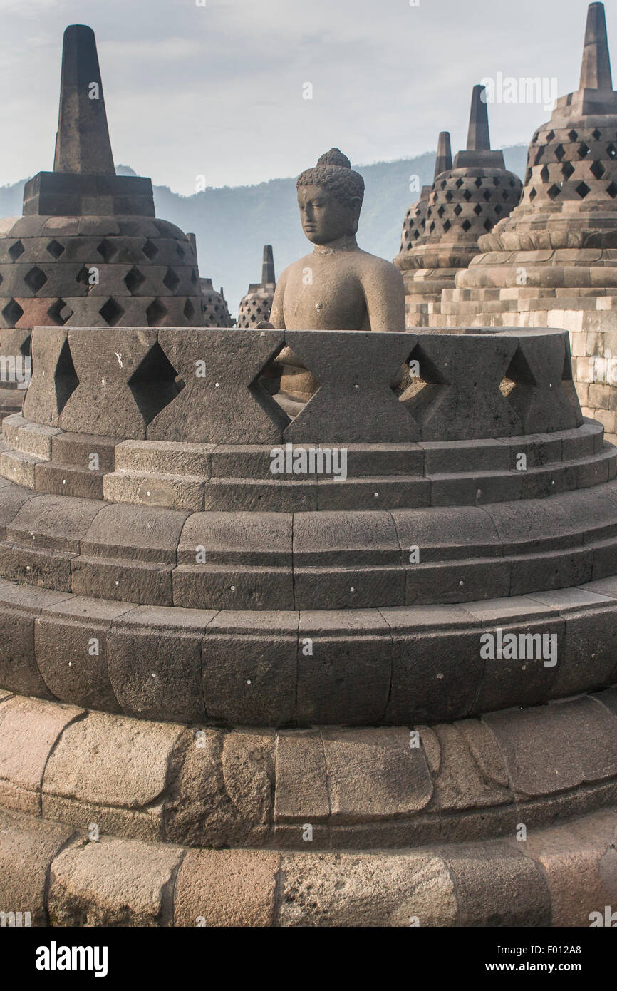 Statue of the Buddha at the 9th-century Buddhist temple, Borobudur, of ...