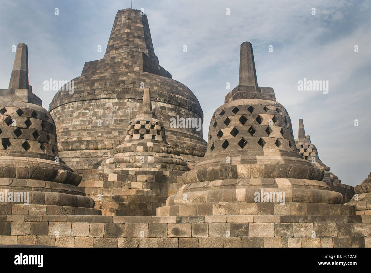 Stupas at the 9th-century Buddhist temple, Borobudur, of Java ...