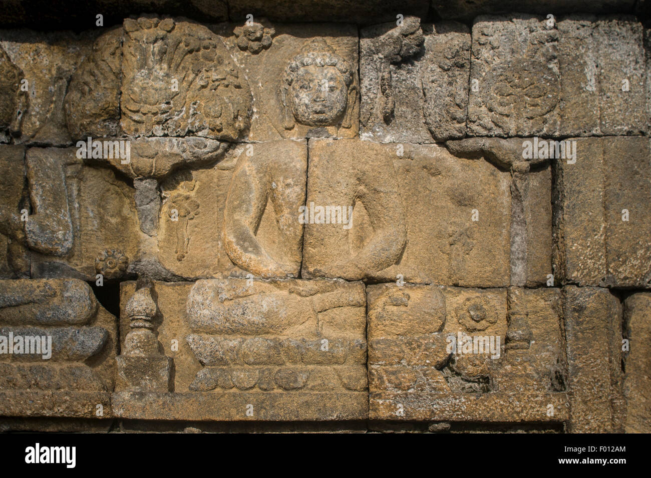 Wall carving featuring the Buddha at the 9th-century Buddhist temple ...