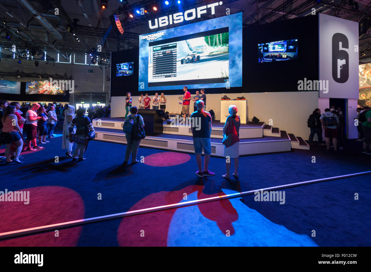 Cologne, Germany. 05th Aug, 2015. Visitors at the Ubisoft booth at the ...