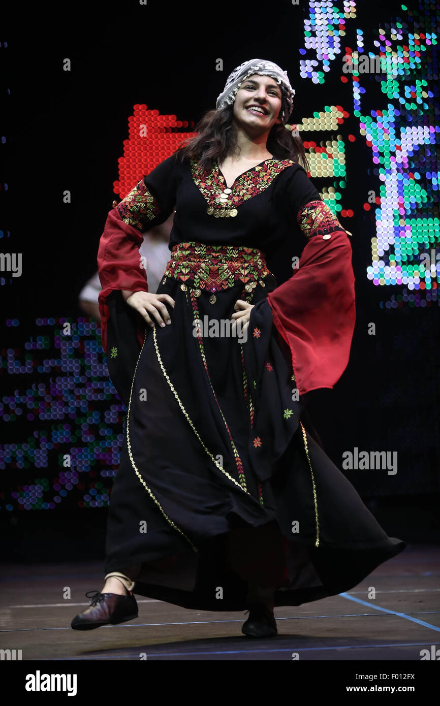Ramallah. 5th Aug, 2015. A dancer of Palestinian popular art troupe ...