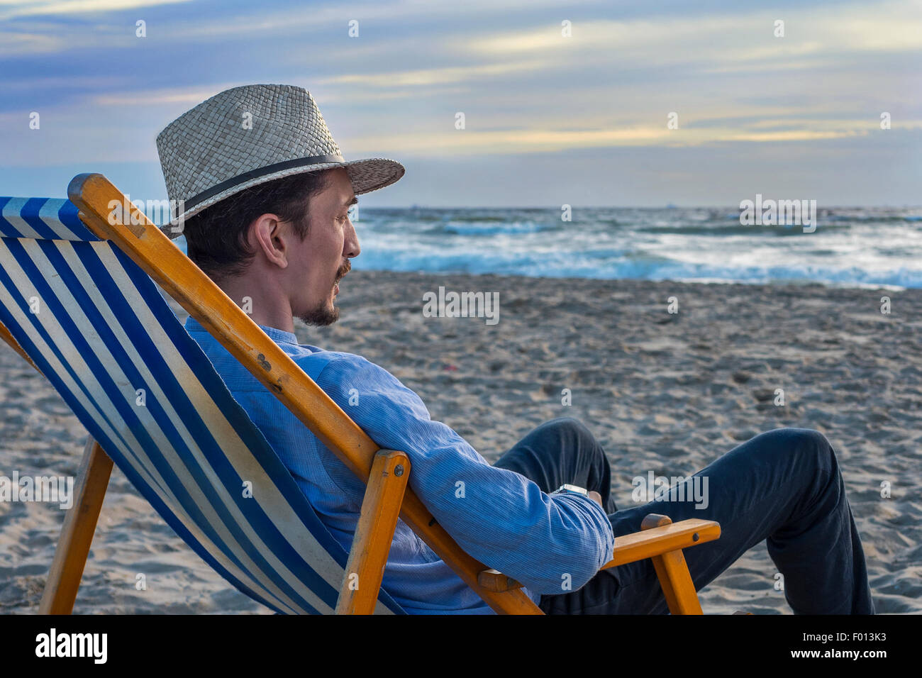 Man Watching Sunset At The Beach High Resolution Stock Photography and ...