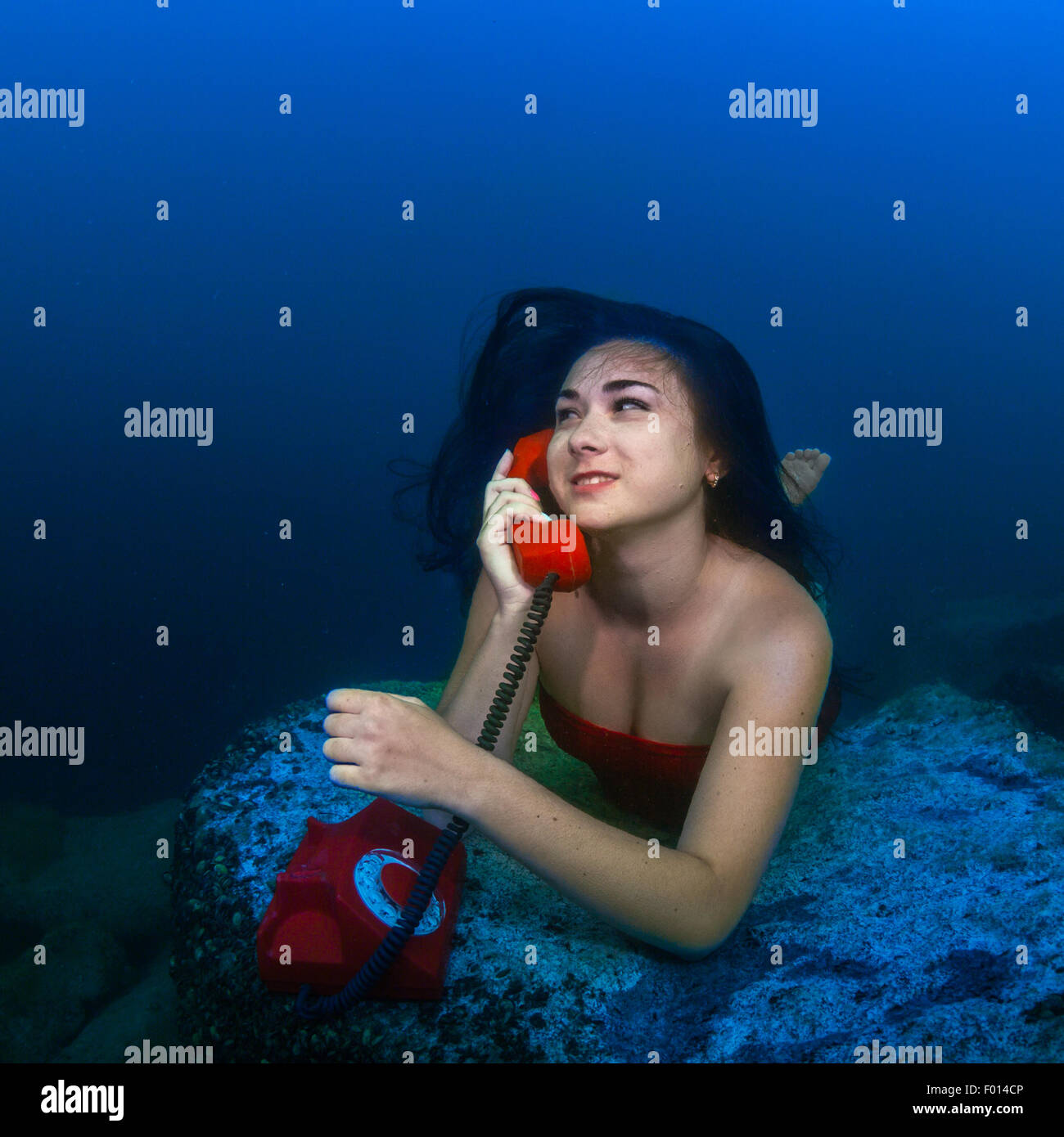 Woman underwater hi-res stock photography and images - Alamy