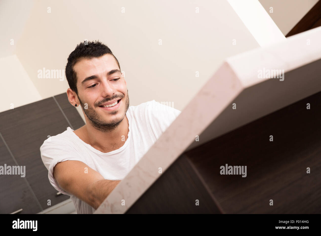 Casual contemplative hispanic young hi-res stock photography and images ...