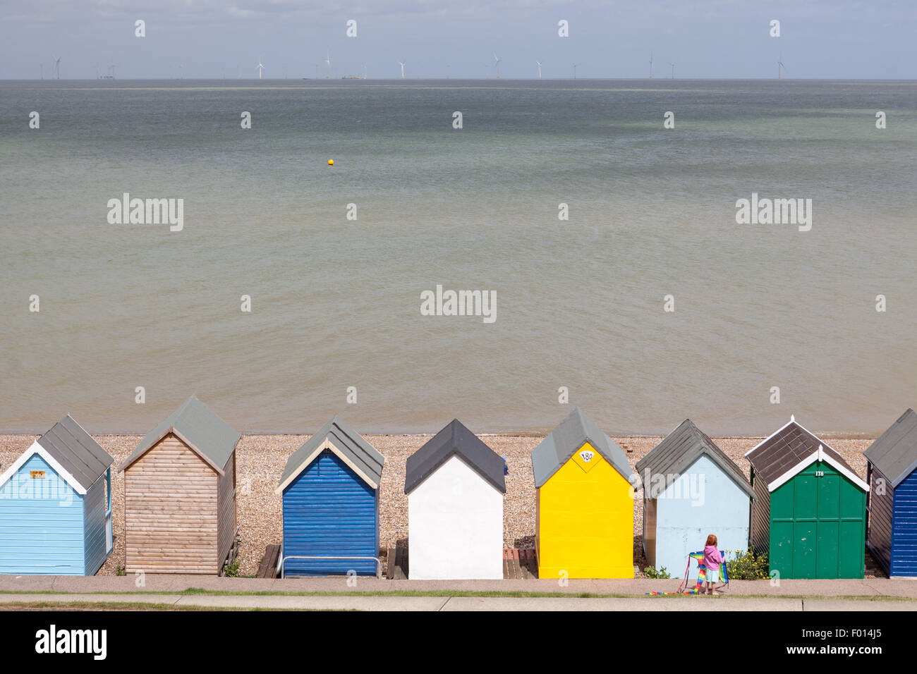 Beach huts uk playing hi-res stock photography and images - Alamy