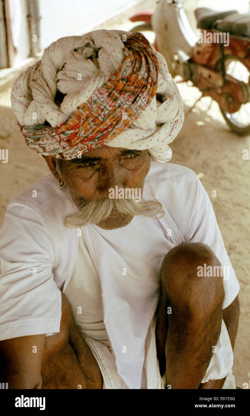 man resting outside house Stock Photo - Alamy