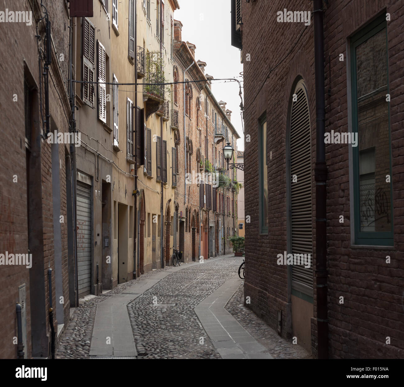 Ancient medieval street in the downtown of Ferrara city Stock Photo - Alamy