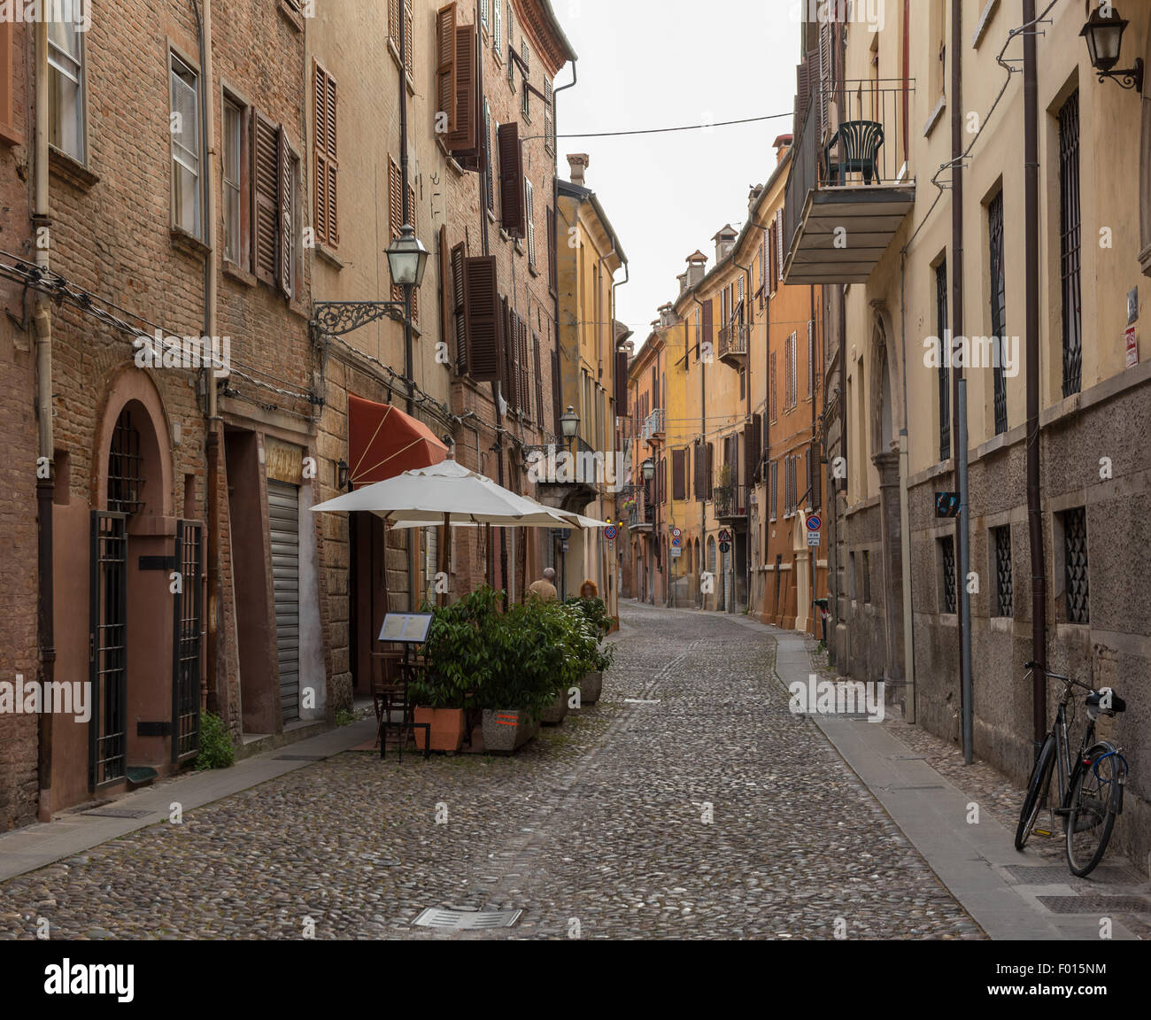 Ancient medieval street in the downtown of Ferrara city Stock Photo - Alamy
