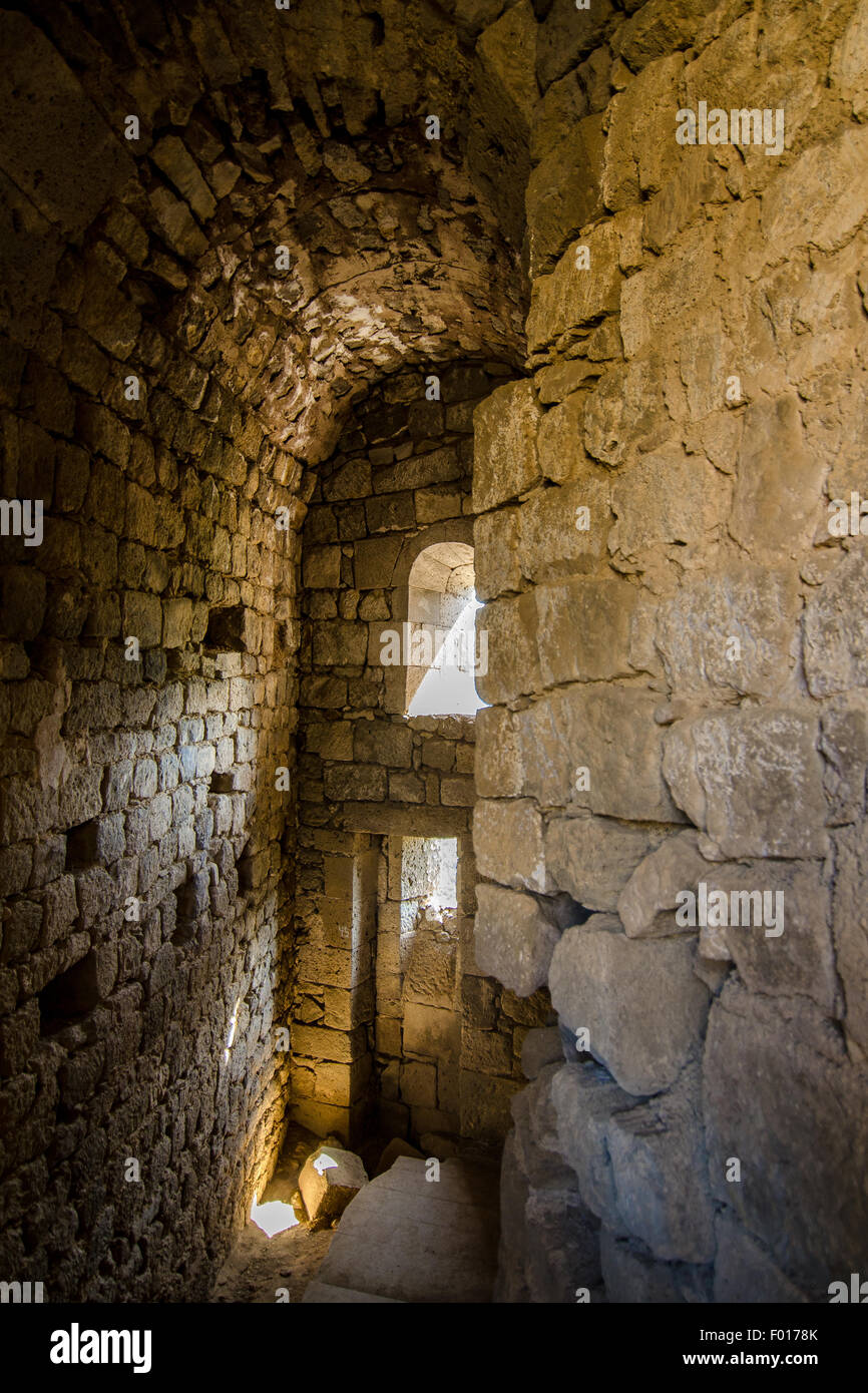 Historic stone room in an ancient building with arched windows and ...
