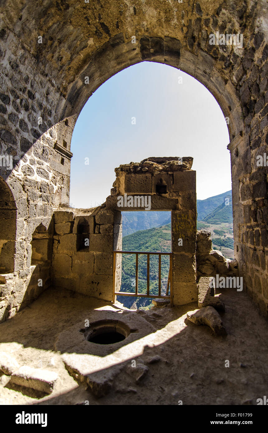 Historic stone room in an ancient building with arched windows and ...