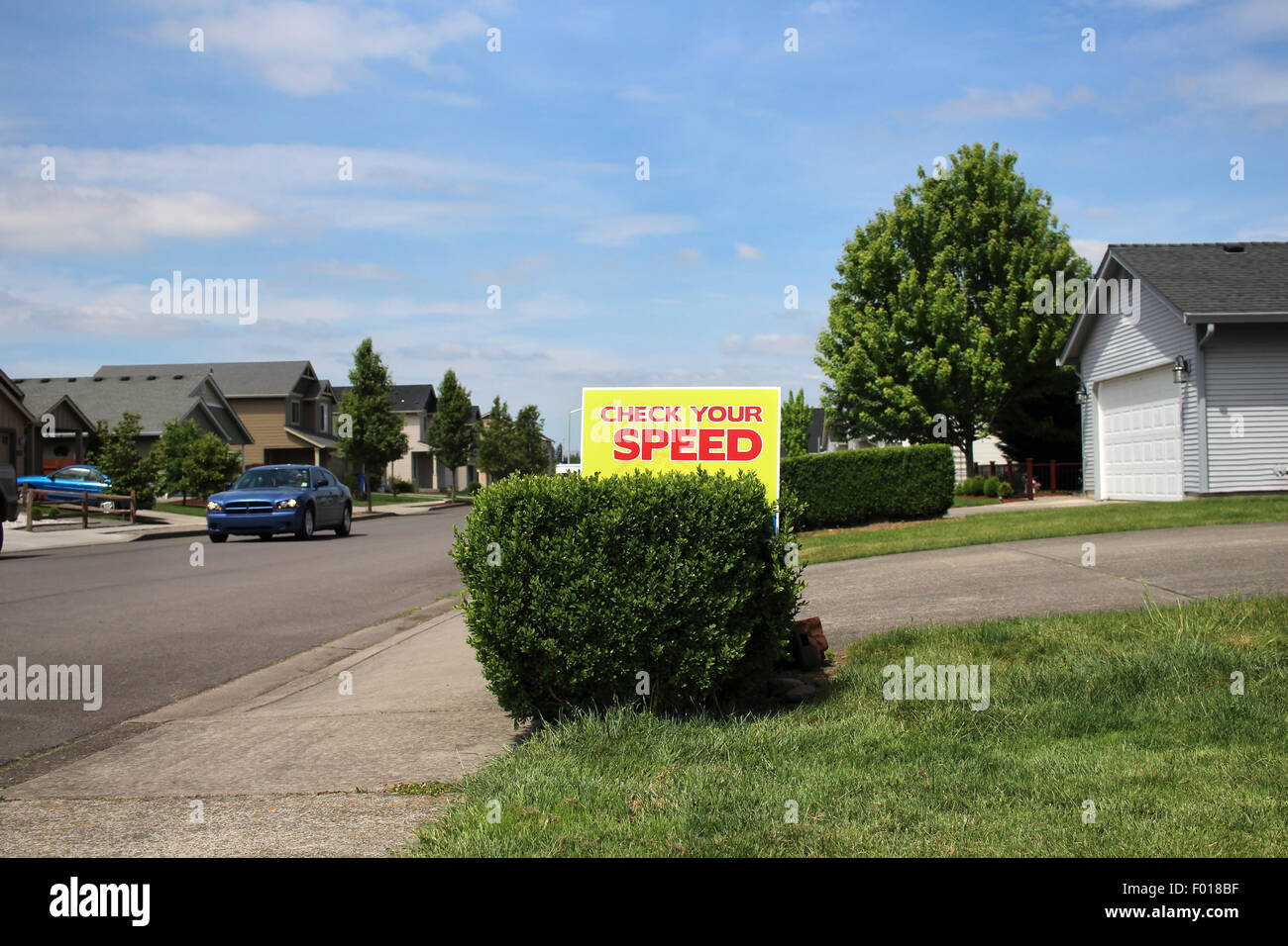 Check Your Speed sign in neighborhood Stock Photo - Alamy