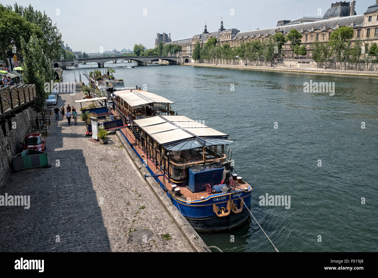 Tour and Party Boats Docked at the Edge of the RIver Seine, Paris ...