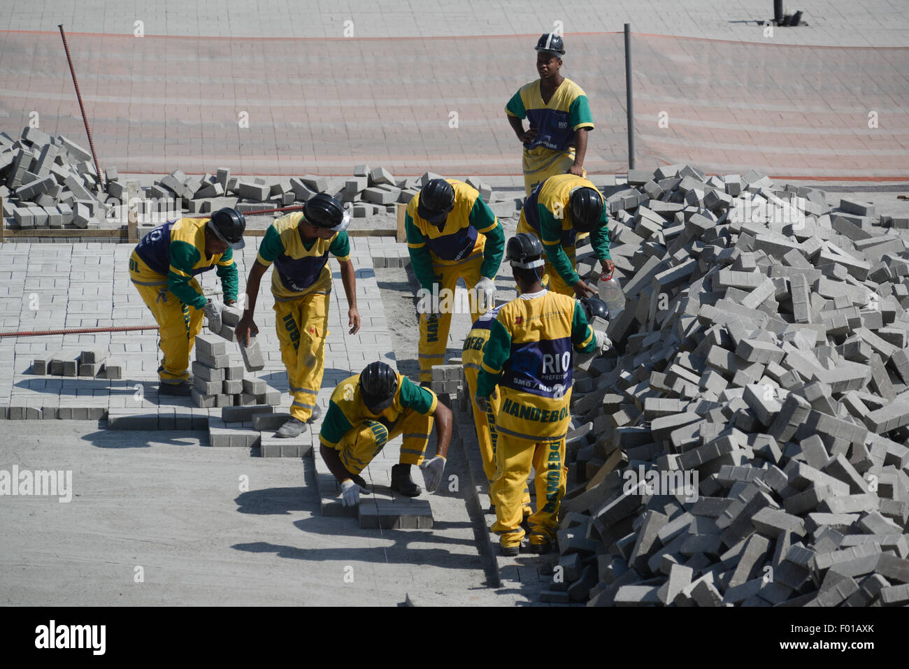 Rio De Janeiro, Brazil. 5th Aug, 2015. Employees work on the ...