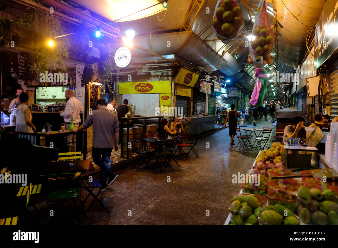 Night scene in Mahane or Machane Yehuda market often referred to as ...