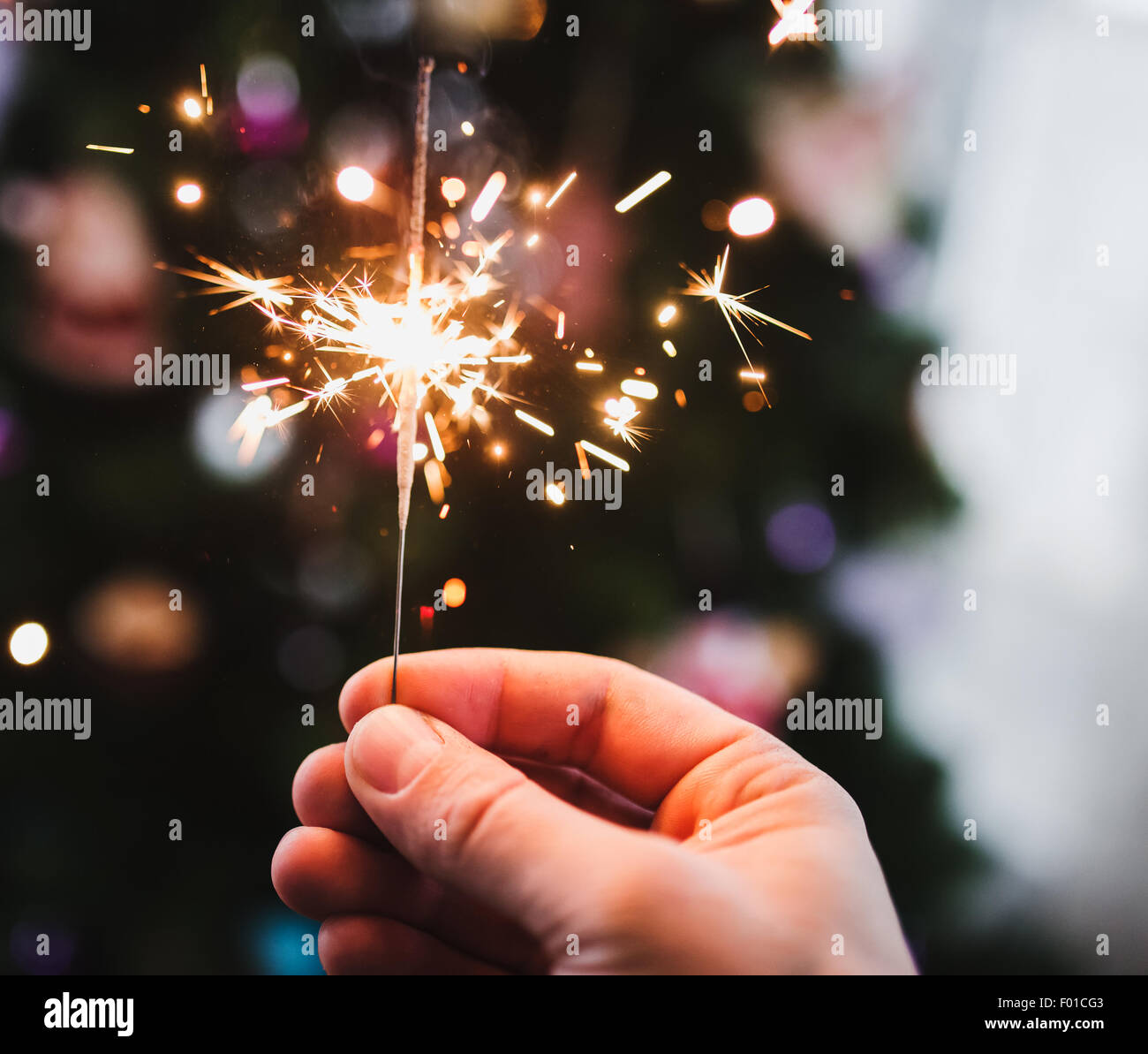 Hand with Sparkler Stock Photo - Alamy