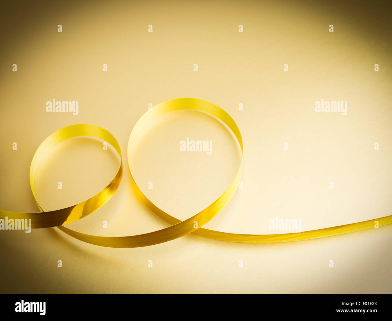 Golden ribbon on blank hi-res stock photography and images - Alamy