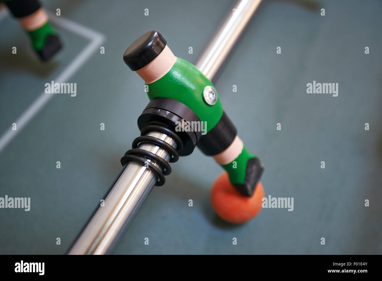 Macro of a unity in a foosball match. White character Stock Photo - Alamy