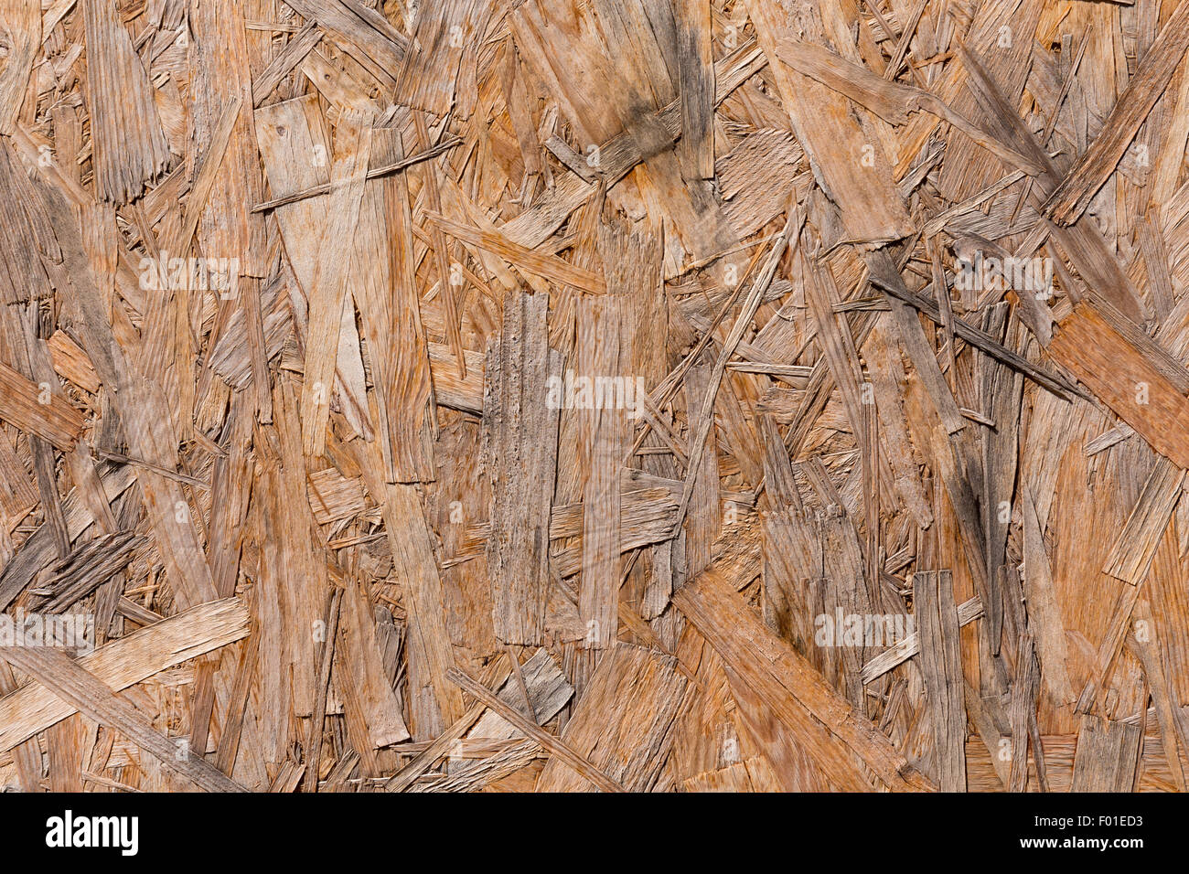 Old plywood recycled compressed wood chippings board background texture ...
