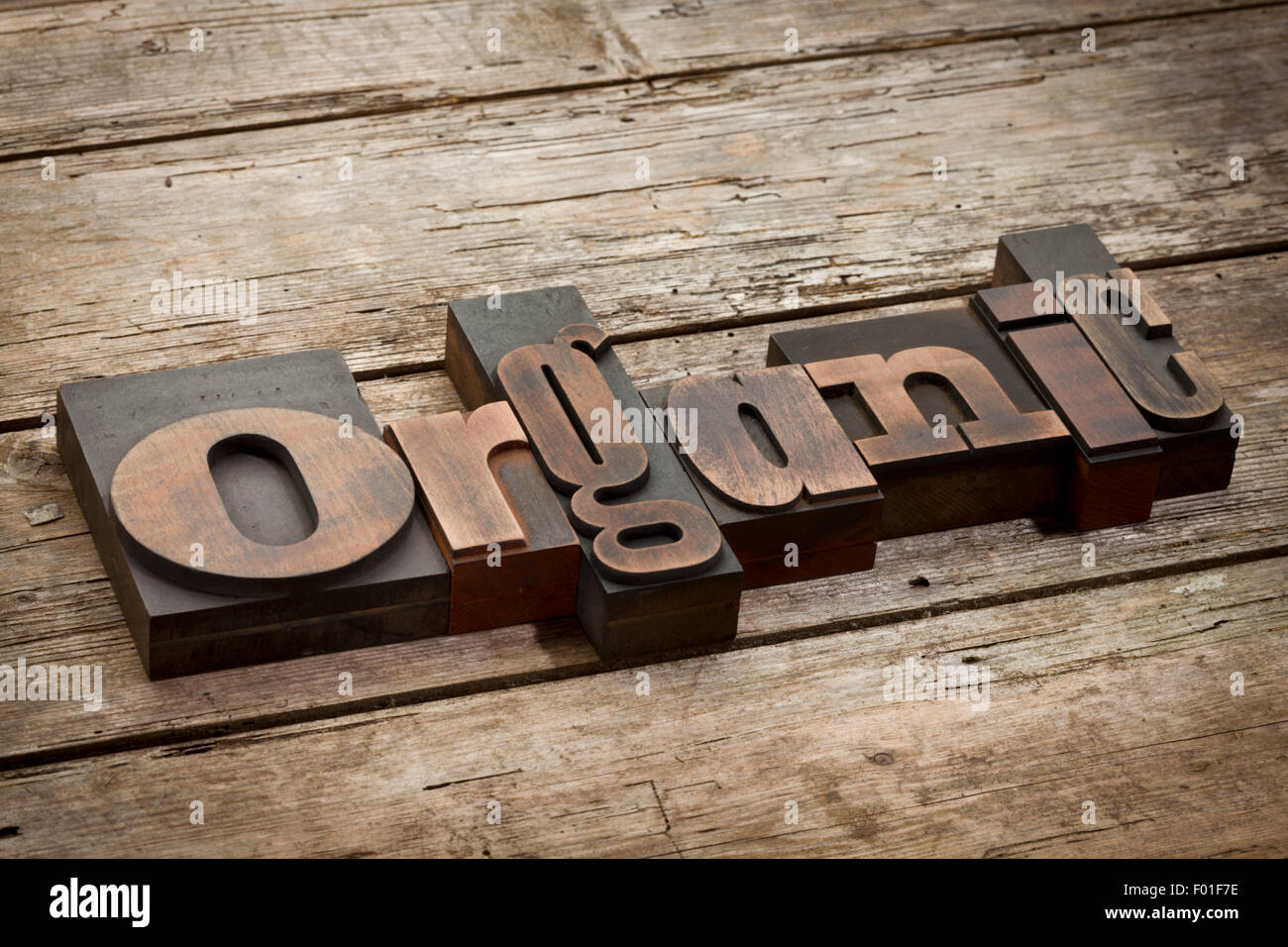organic, word written with vintage letterpress printing blocks, angled ...
