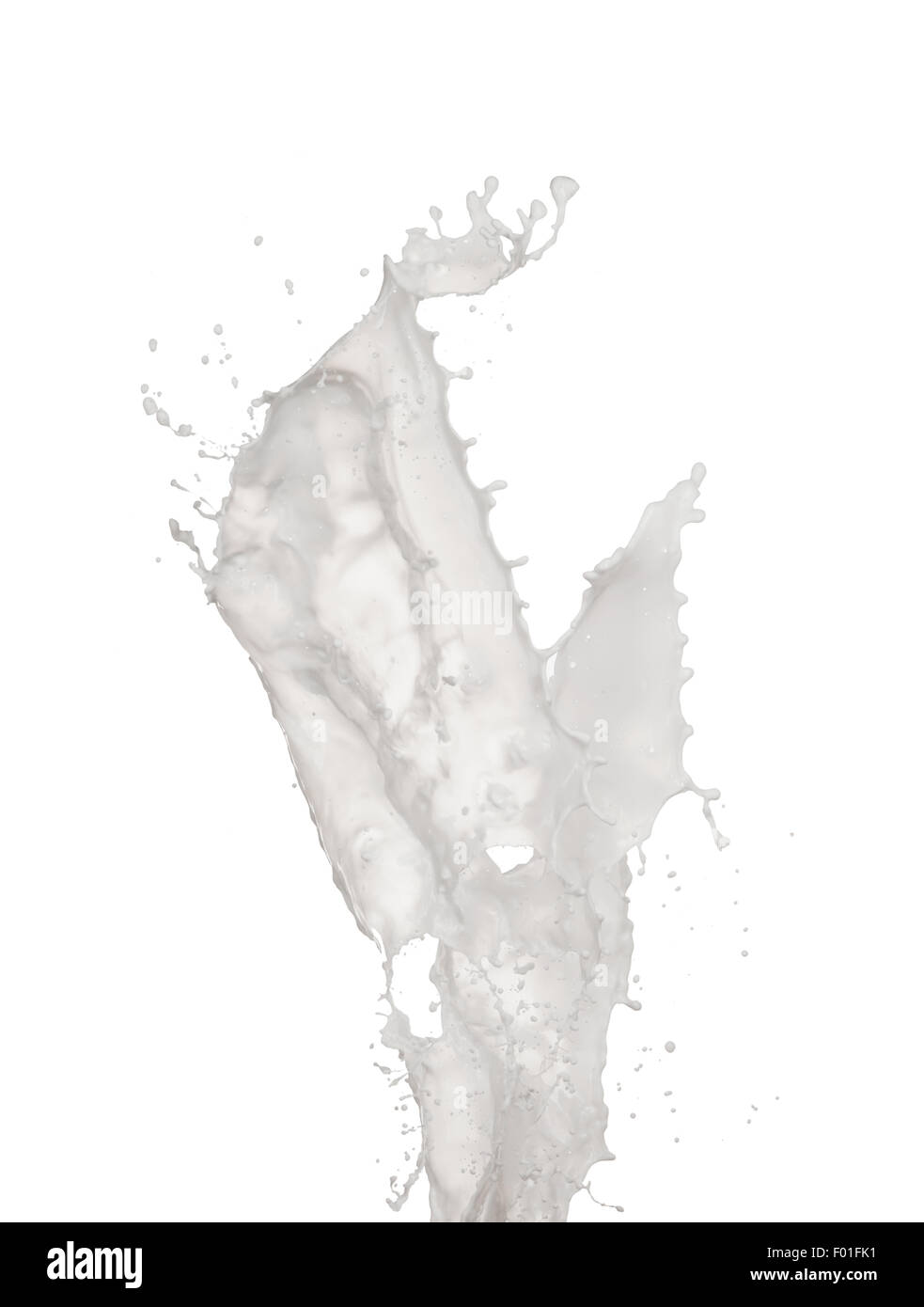 Milk splash isolated on white background Stock Photo - Alamy