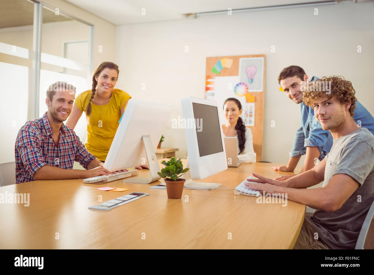 Group working on laptops hi-res stock photography and images - Alamy