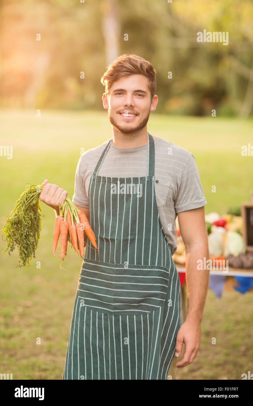 Handsome farmer smiling at camera Stock Photo - Alamy
