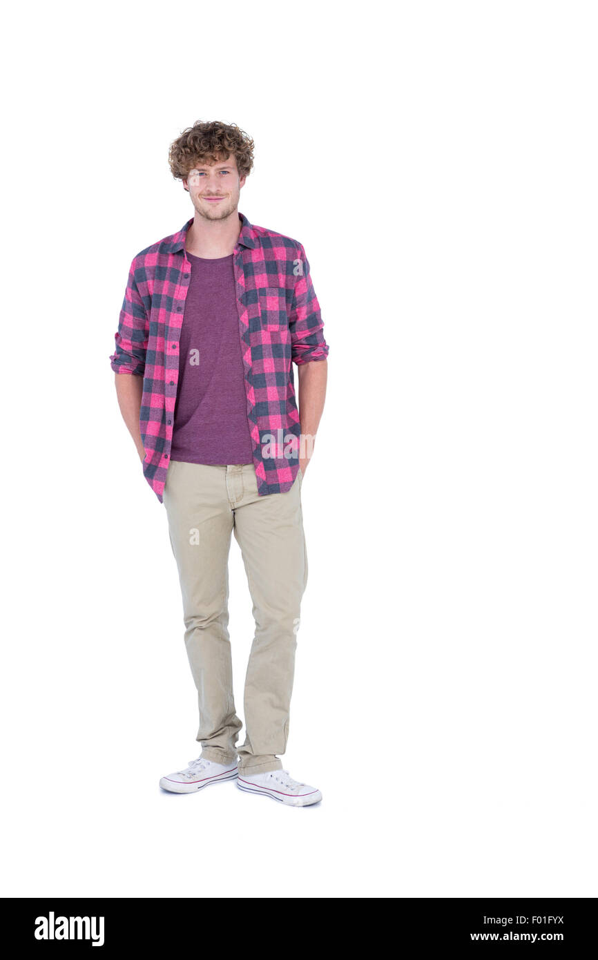 Smiling looking at camera standing hands in pockets hi-res stock ...