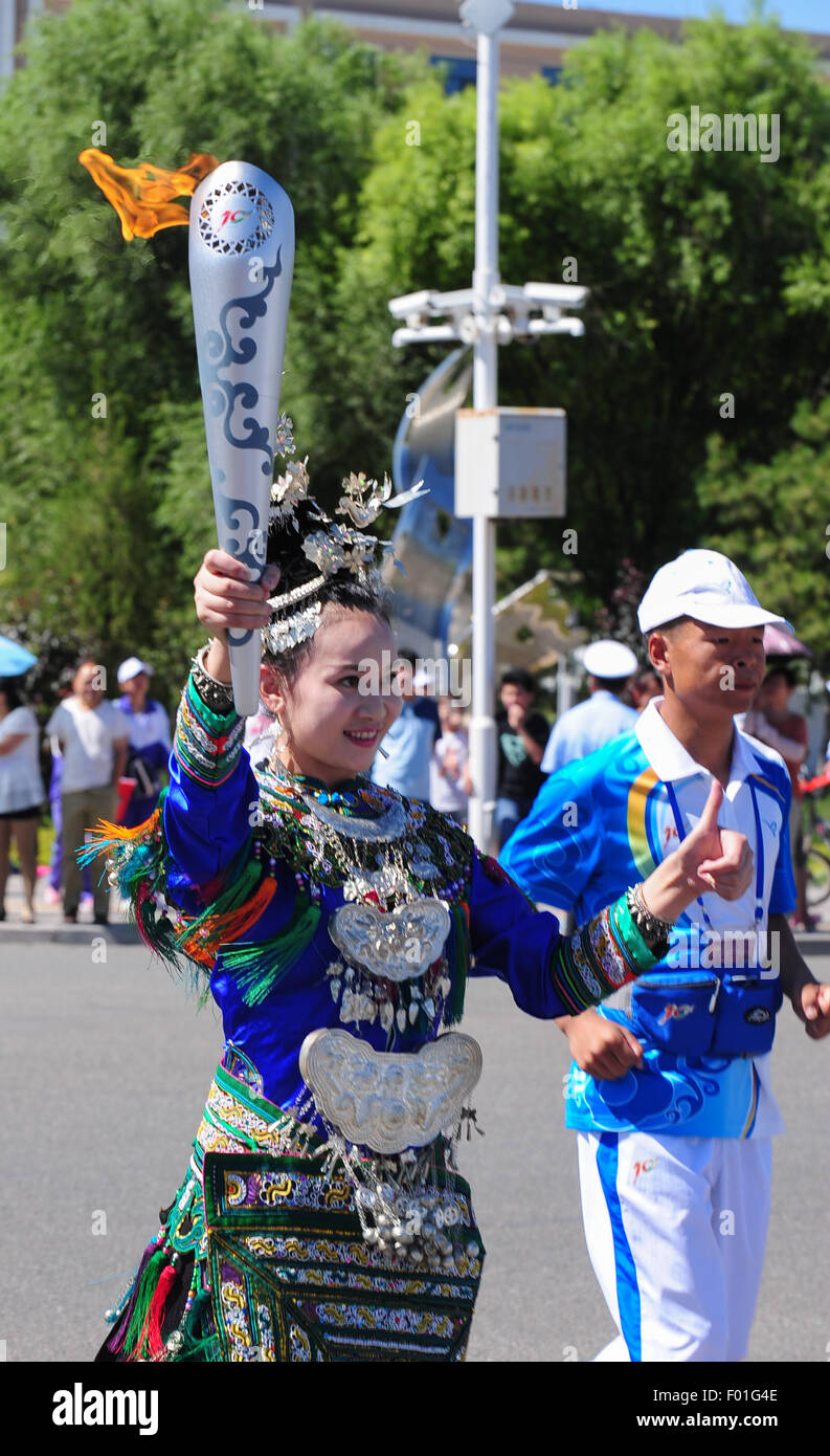 Erdos, Inner Mongolia Autonomous Region. 6th Aug, 2015. Torch bearer Wu ...