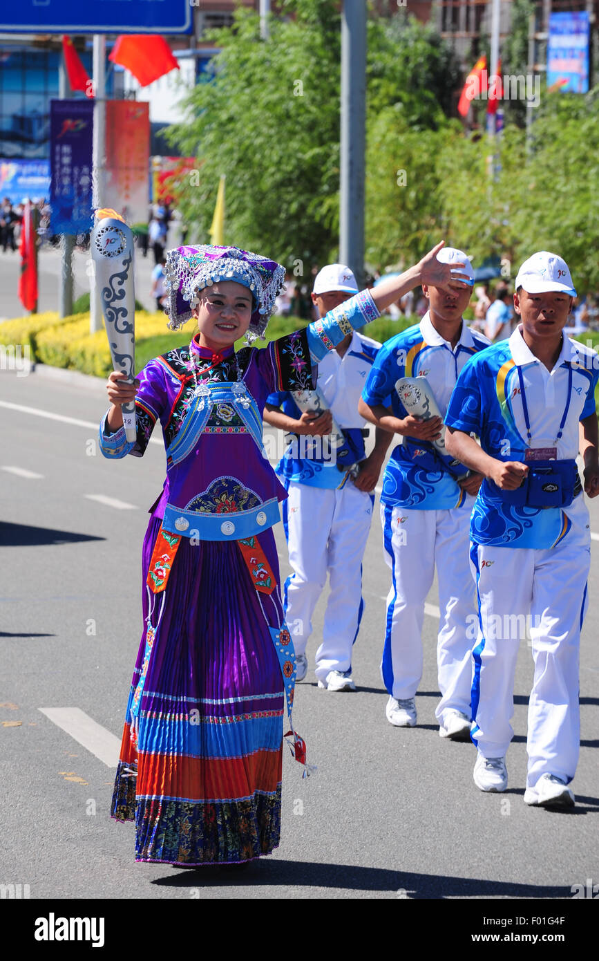 Erdos, Inner Mongolia Autonomous Region. 6th Aug, 2015. Torch bearer ...