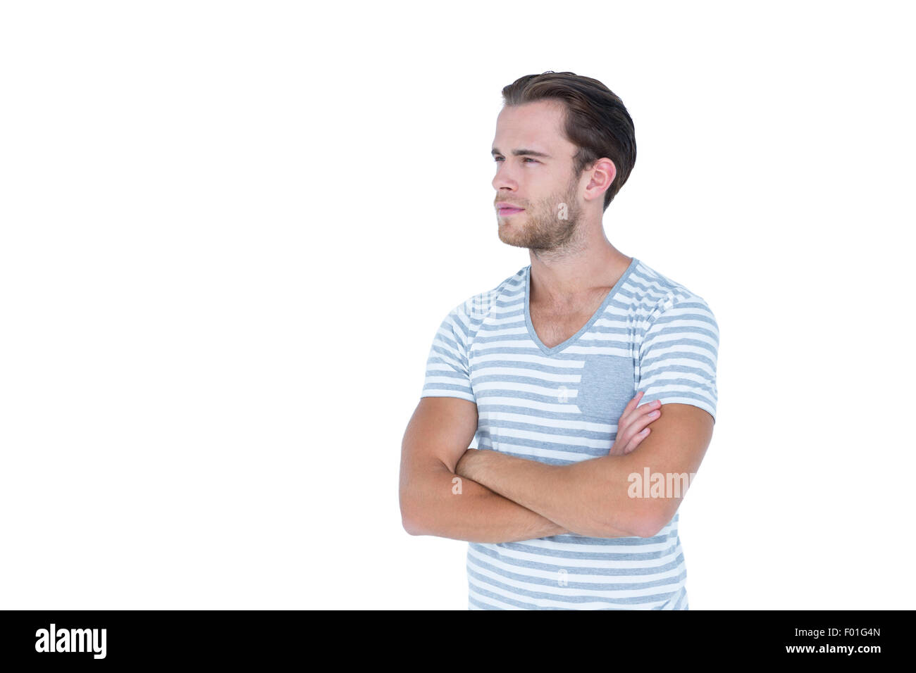 Thoughtful handsome man standing Cut Out Stock Images & Pictures - Alamy