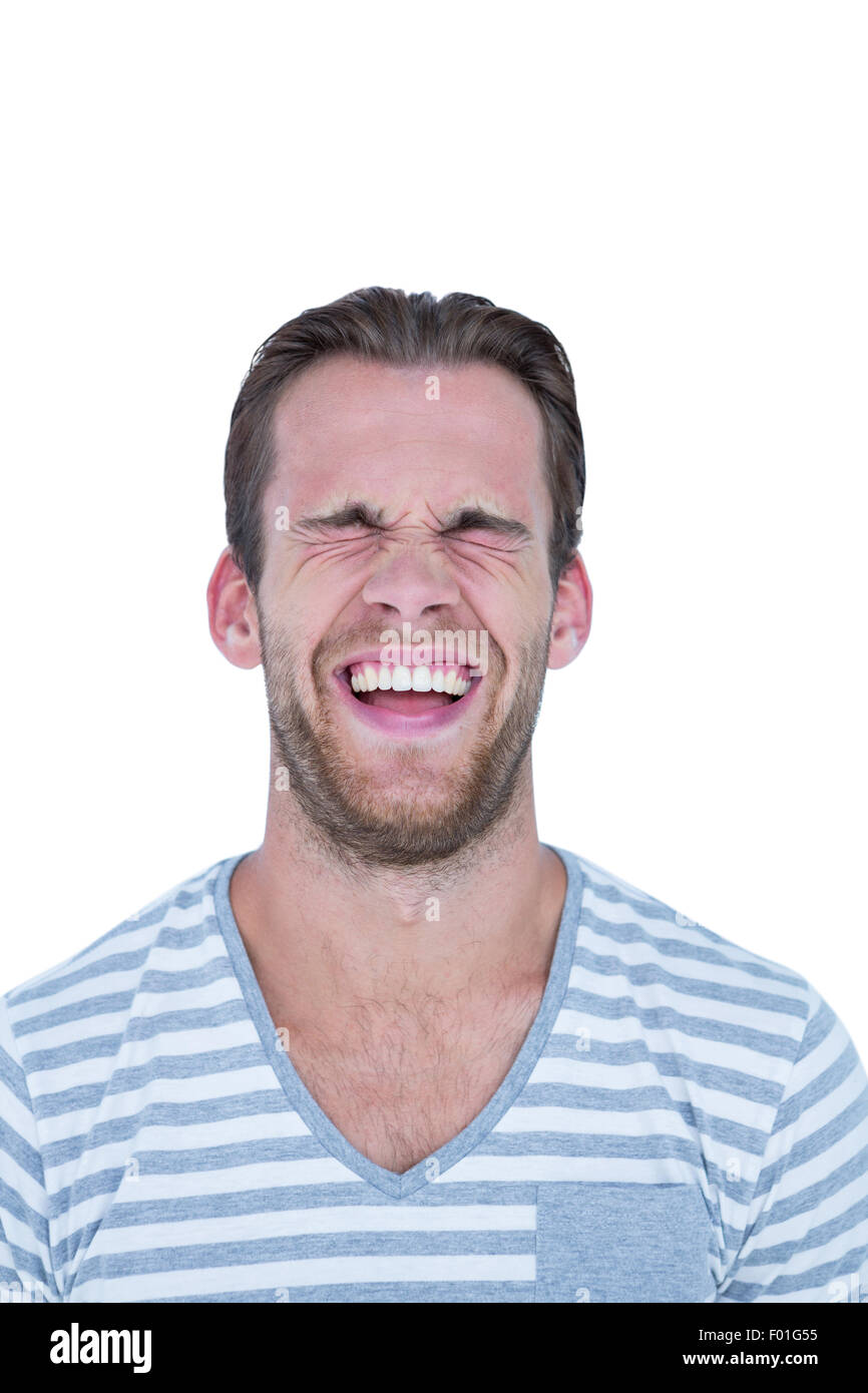 Happy handsome man laughing in front of camera Stock Photo - Alamy