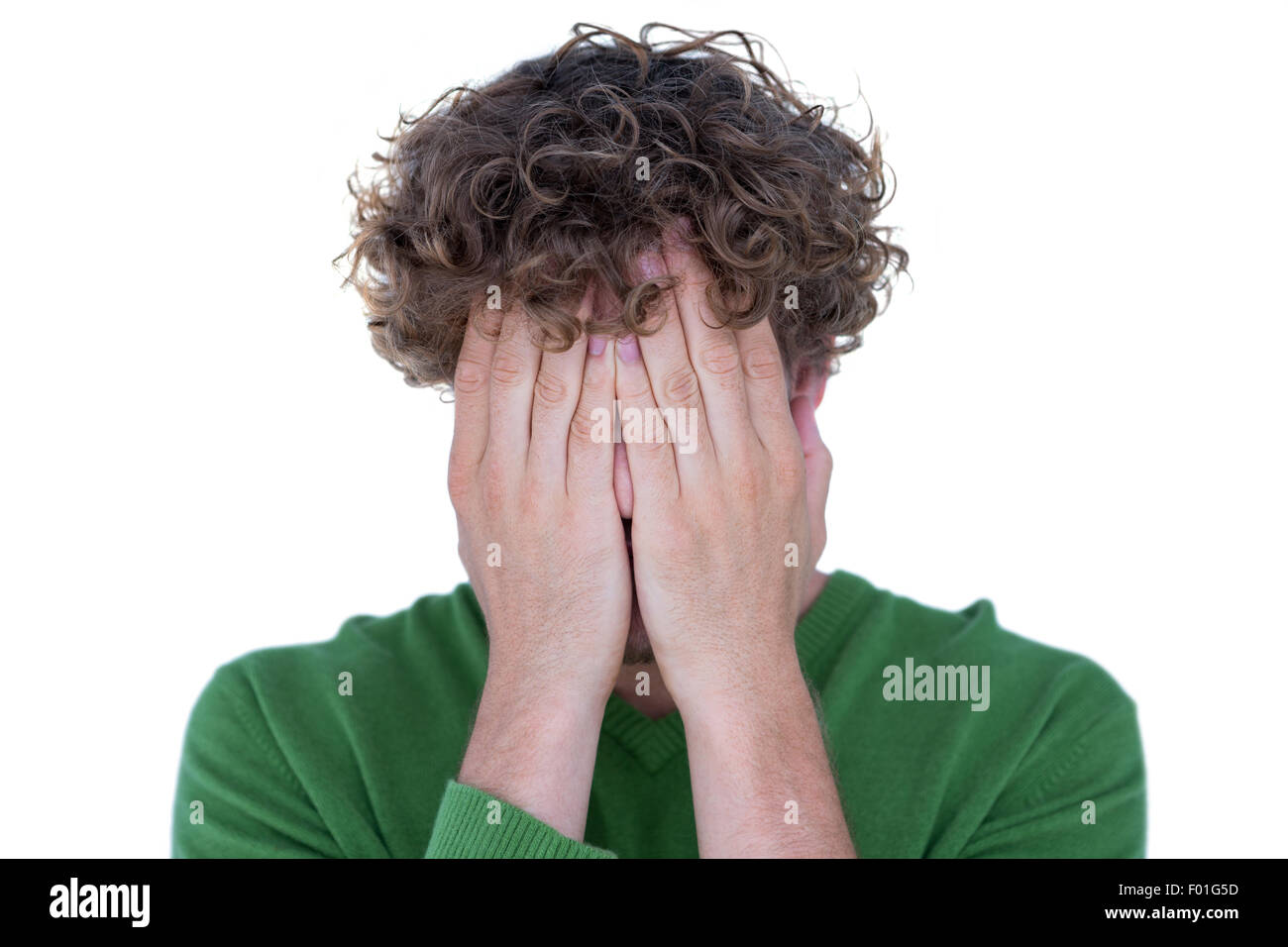 Sad casual man with hands on head Stock Photo - Alamy