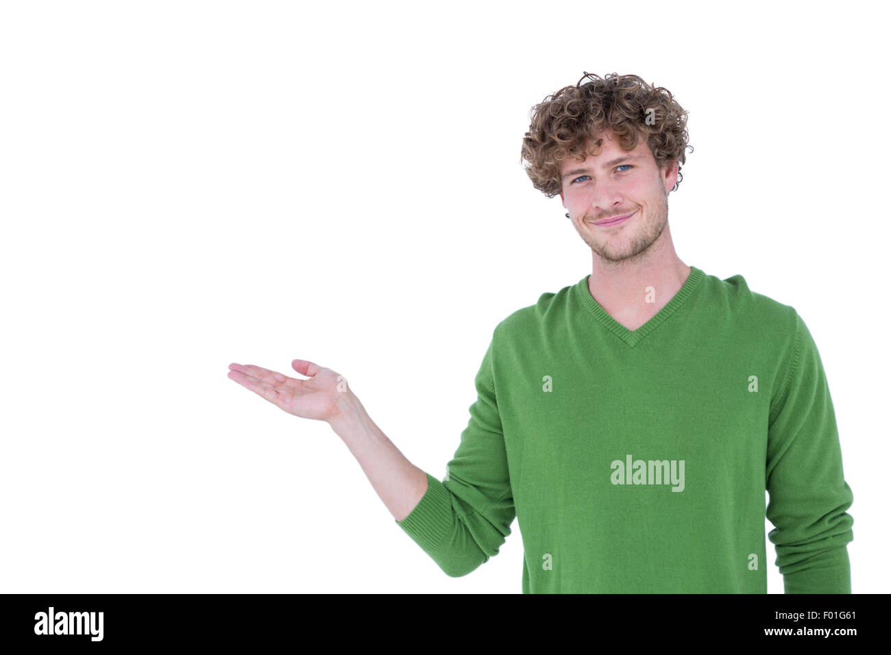 Handsome man holding something in front of camera Stock Photo - Alamy