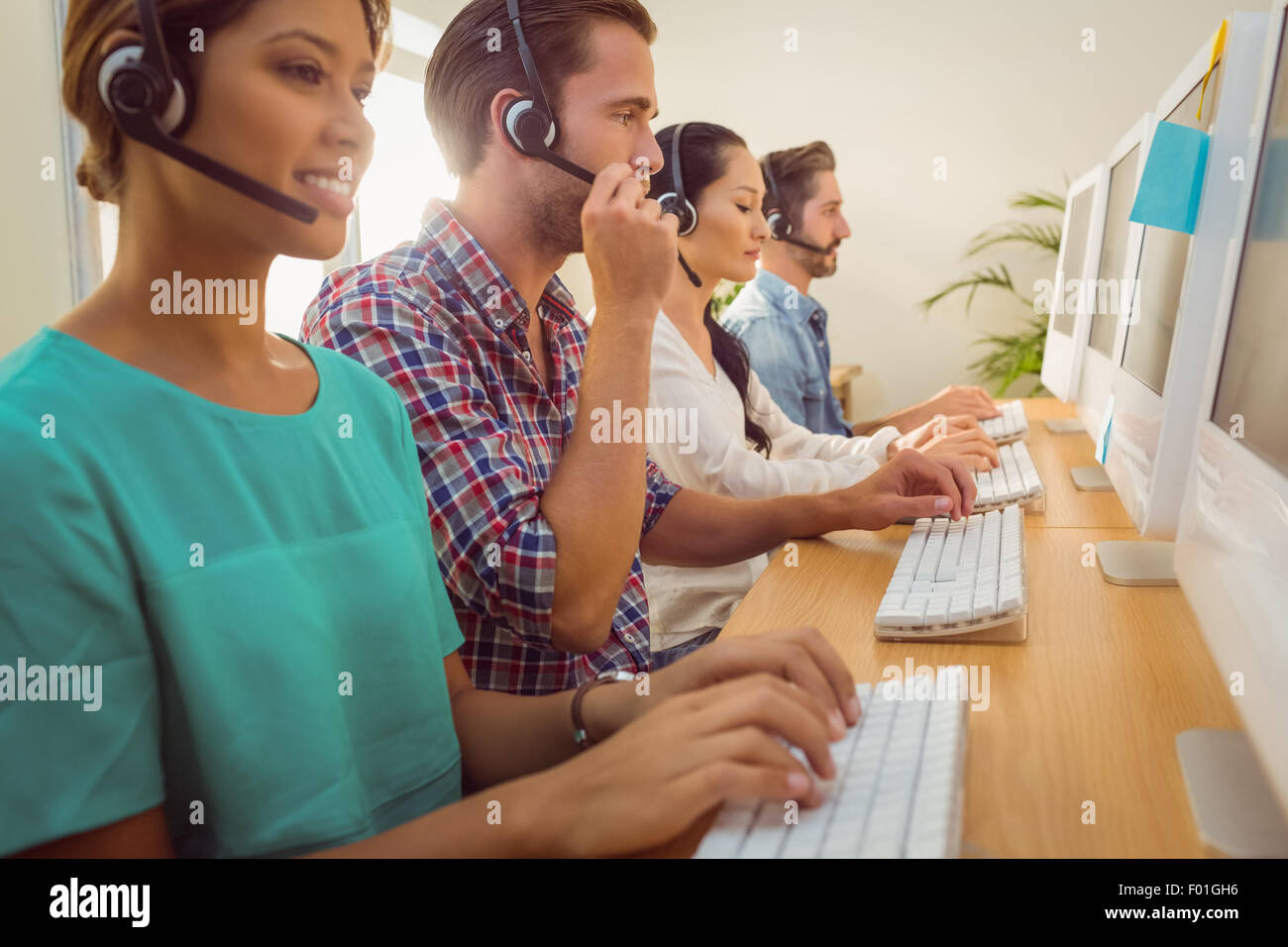 Business team working at the call centre Stock Photo - Alamy