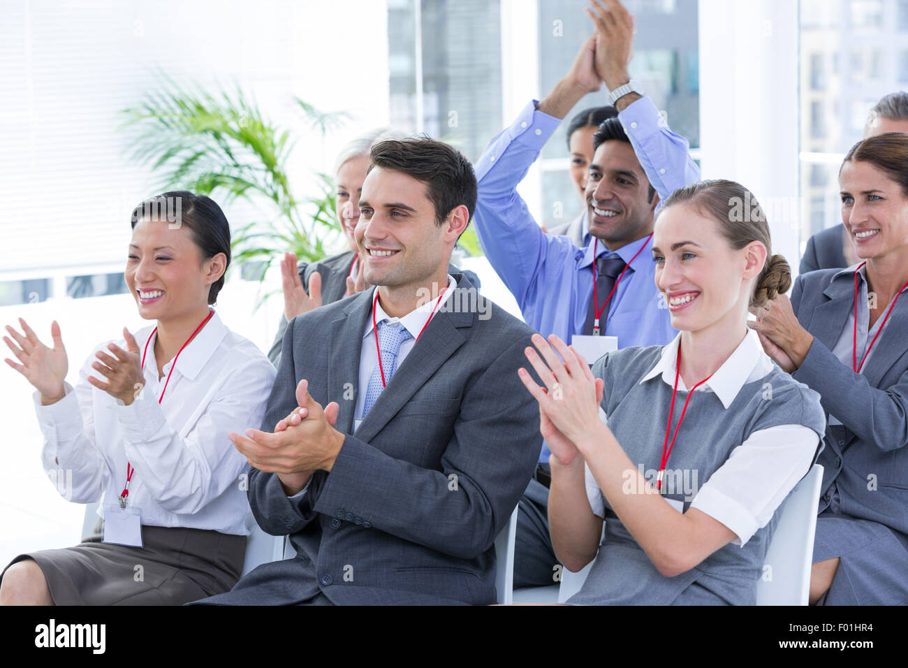 Clapping african woman applauding team hi-res stock photography and ...
