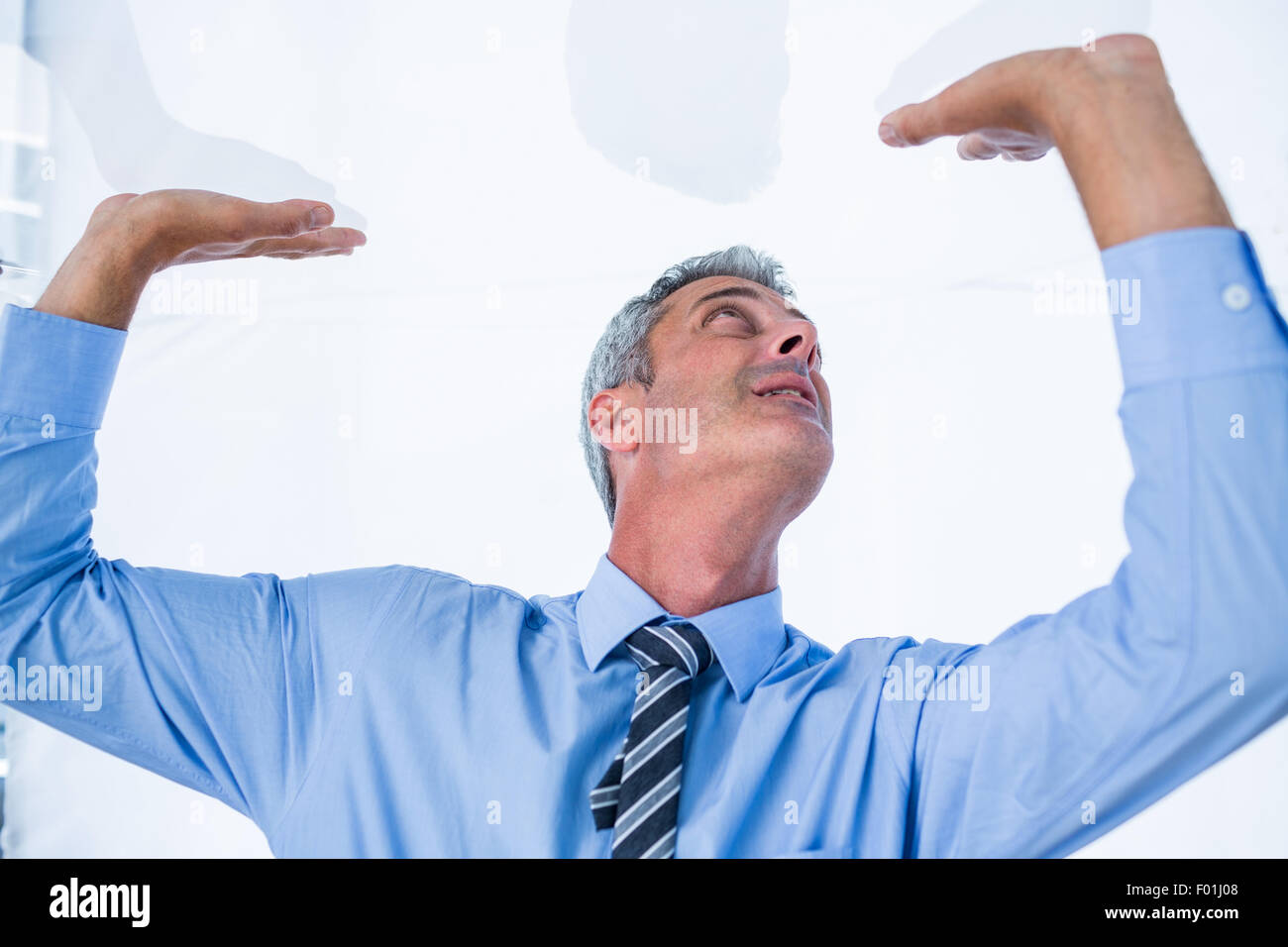 Businessman holding something hands hi-res stock photography and images ...