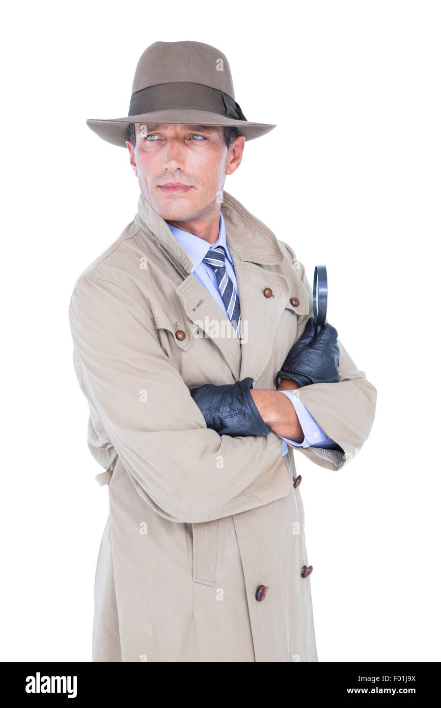 Spy looking through magnifier Stock Photo - Alamy