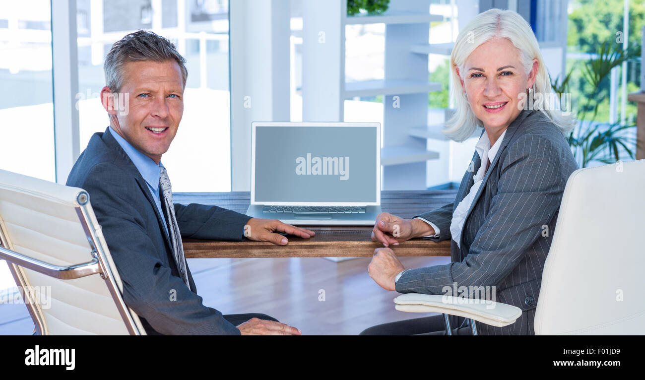 Business people looking at camera Stock Photo - Alamy