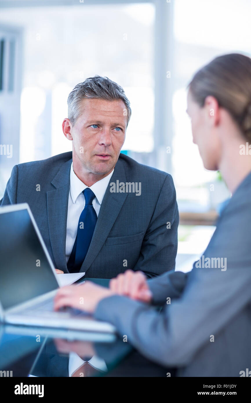 Serious business people working together Stock Photo - Alamy