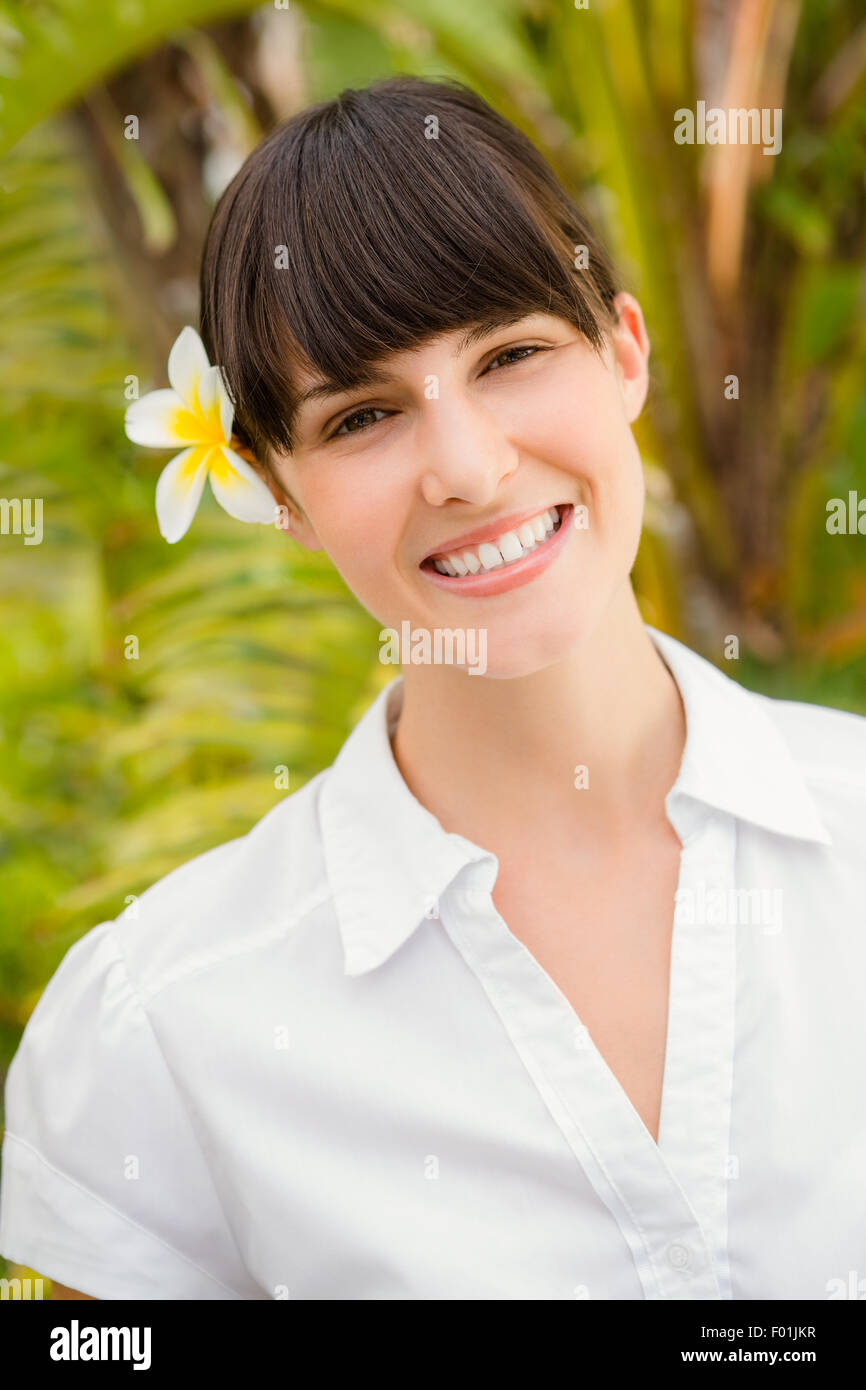Pretty woman smiling at the camera Stock Photo - Alamy