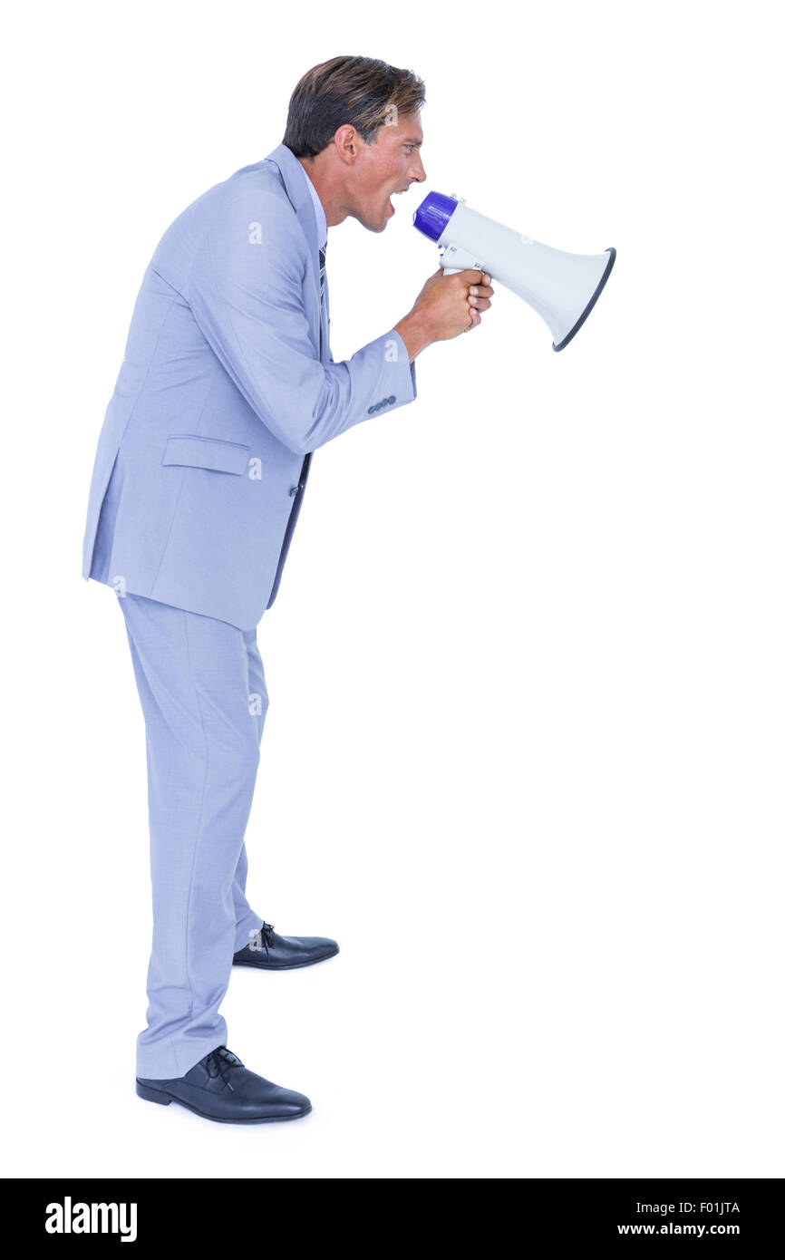 Businessman talking through megaphone Stock Photo - Alamy