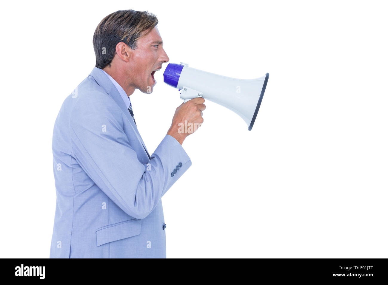 Businessman talking through megaphone Stock Photo - Alamy