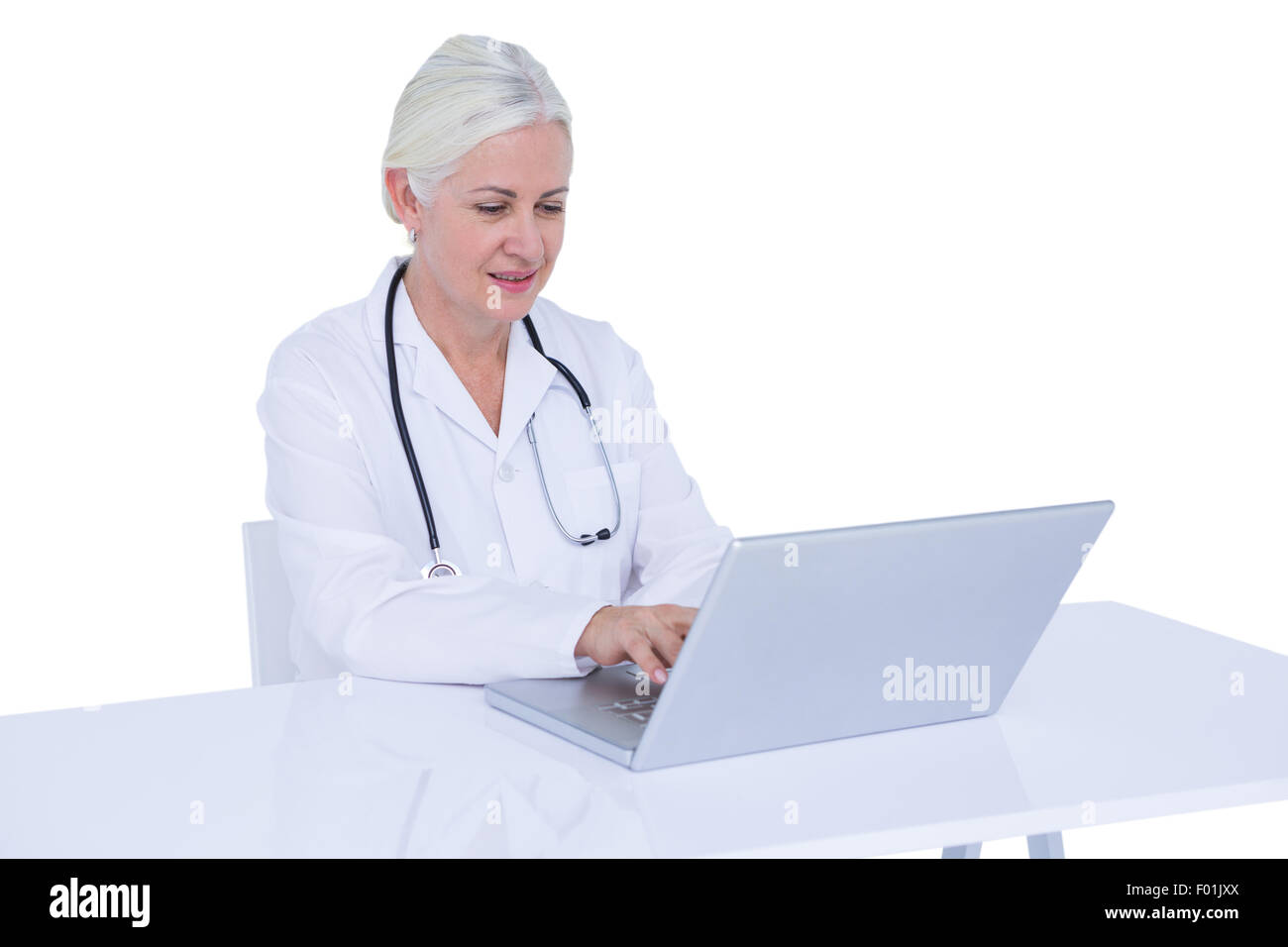 Doctor working on her laptop Stock Photo - Alamy