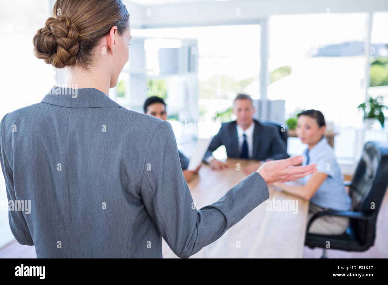 Business people listening during conference Stock Photo - Alamy