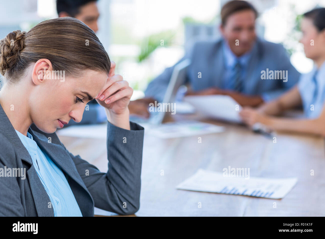 Business people speaking together during meeting Stock Photo - Alamy