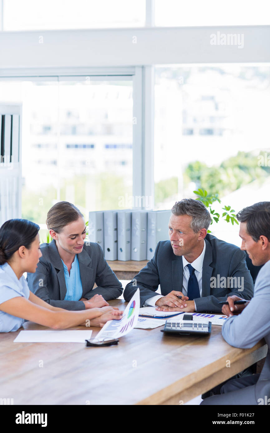 Business people speaking together during meeting Stock Photo - Alamy